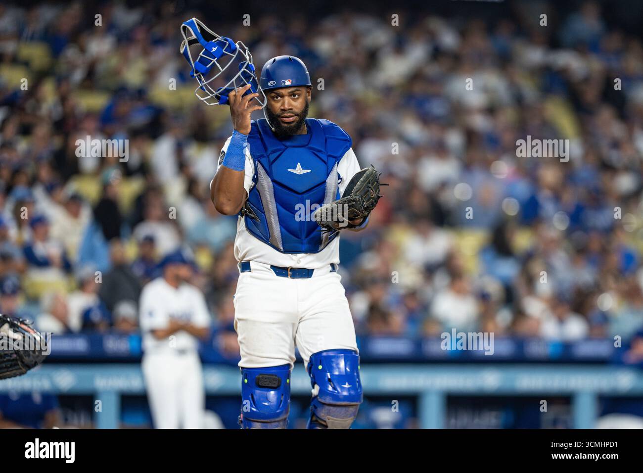 Los Angeles Dodgers catcher Chuckie Robinson (52) takes the field ...