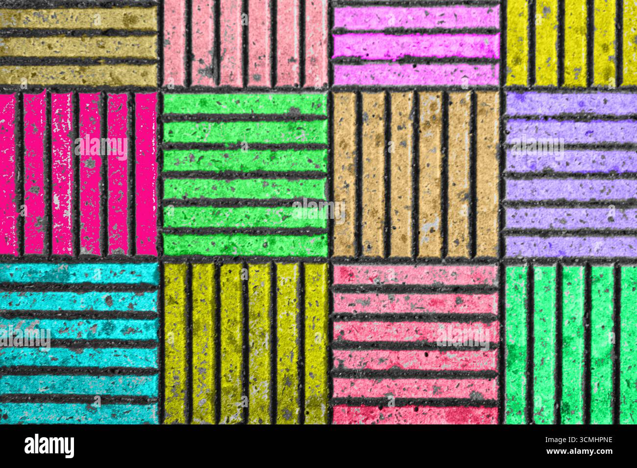 Colorful blocks create a cheerful pattern on the pavement, featuring ...