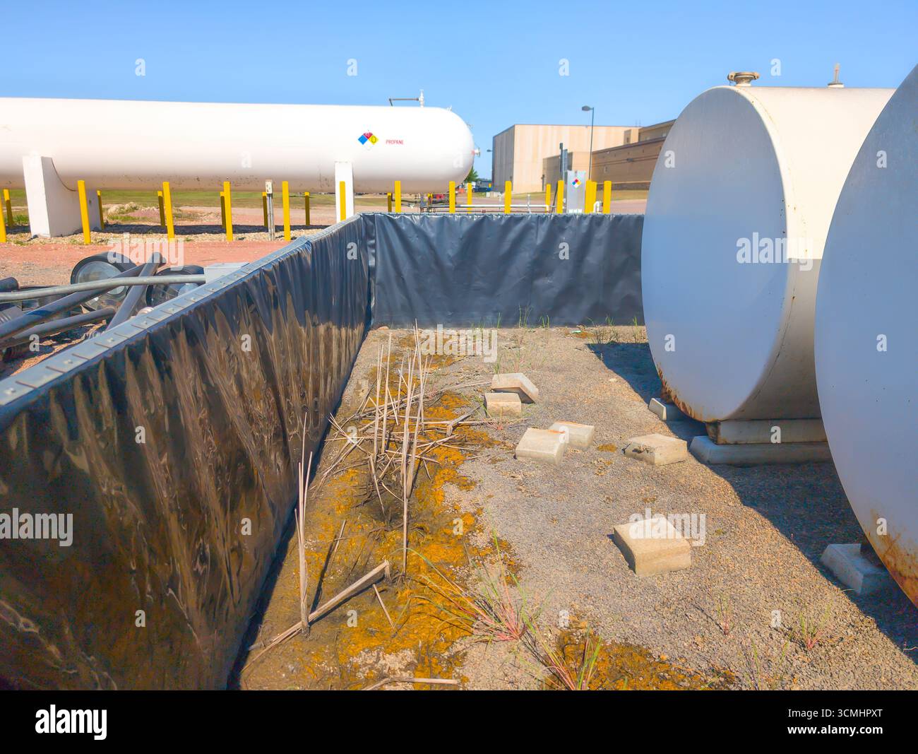 Inside temporary plastic lined secondary containment for fuel storage ...