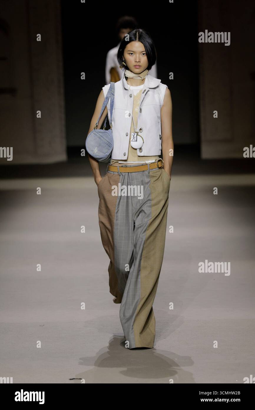 Model Wei Yiting is seen on the catwalk at the Coach fashion show ...