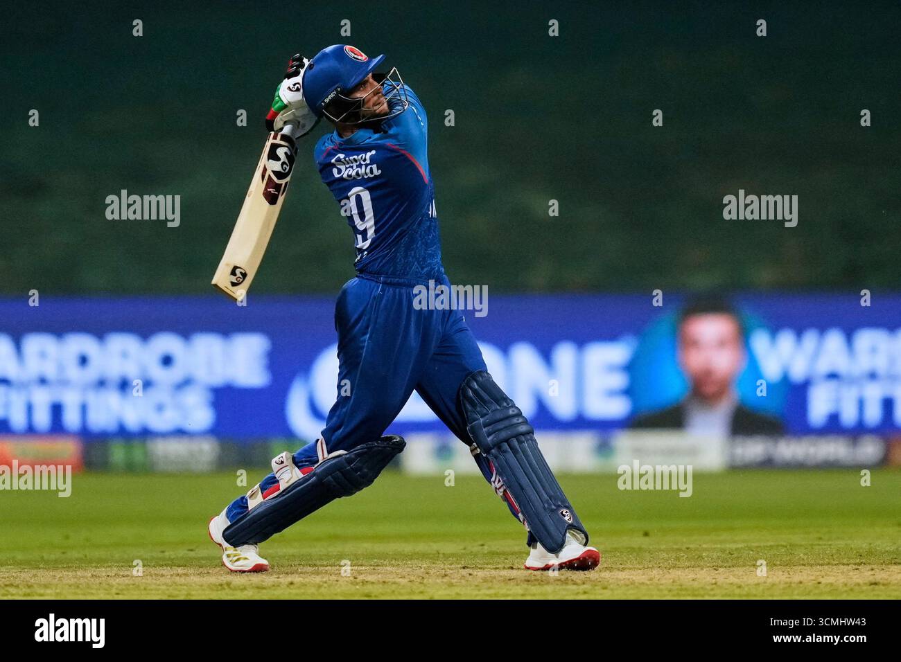 Afghanistan's Karim Janat hits a six during the Asia Cup Cricket match ...