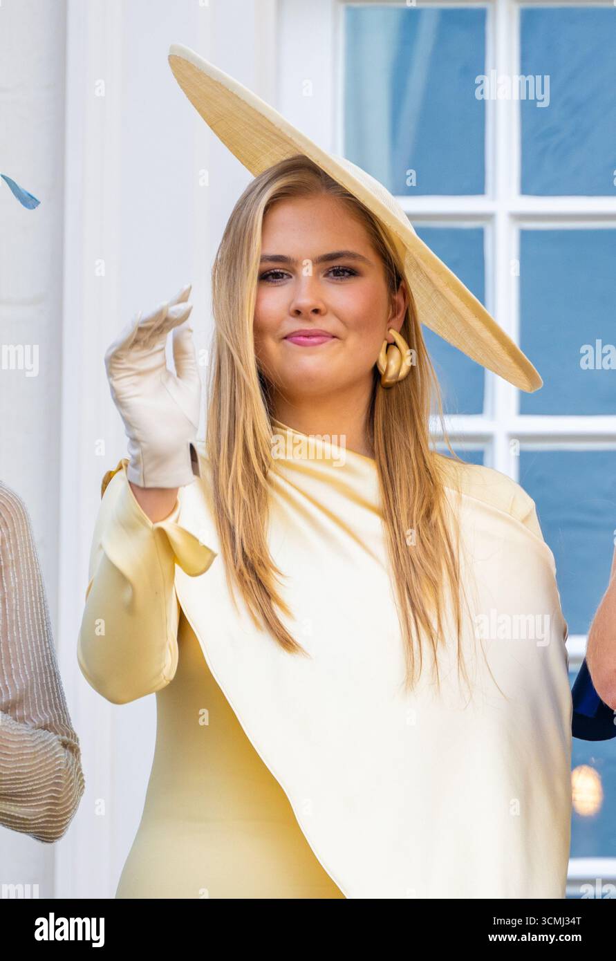Princess Amalia waving to bystanders from the balcony at Noordeinde ...