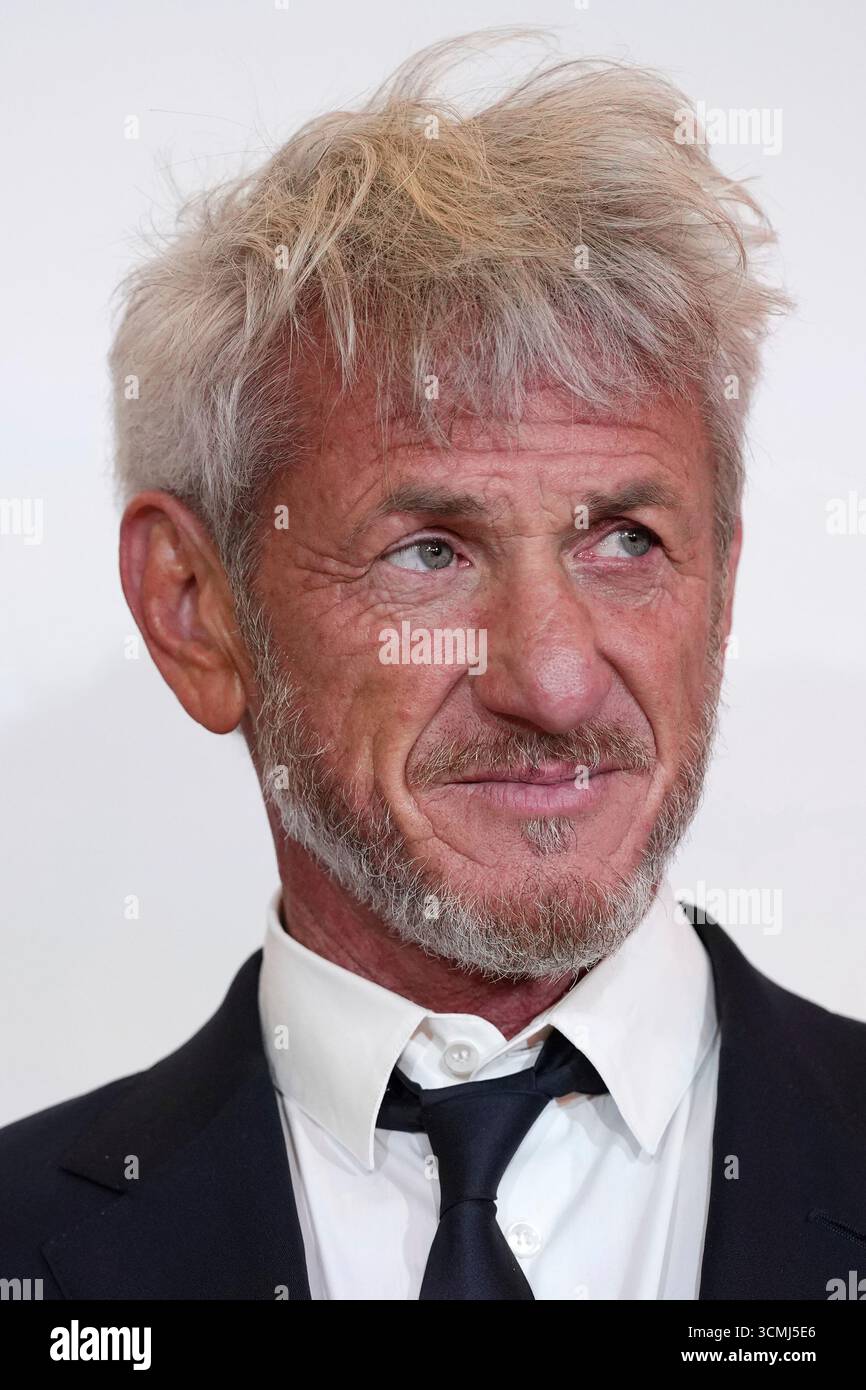 Sean Penn poses for photographers upon arrival at the premiere of the ...