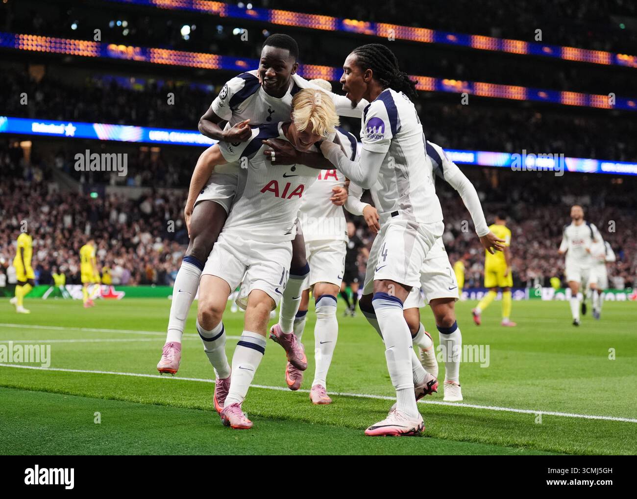 Tottenham Hotspur's Lucas Bergvall and team mates celebrate an own goal ...