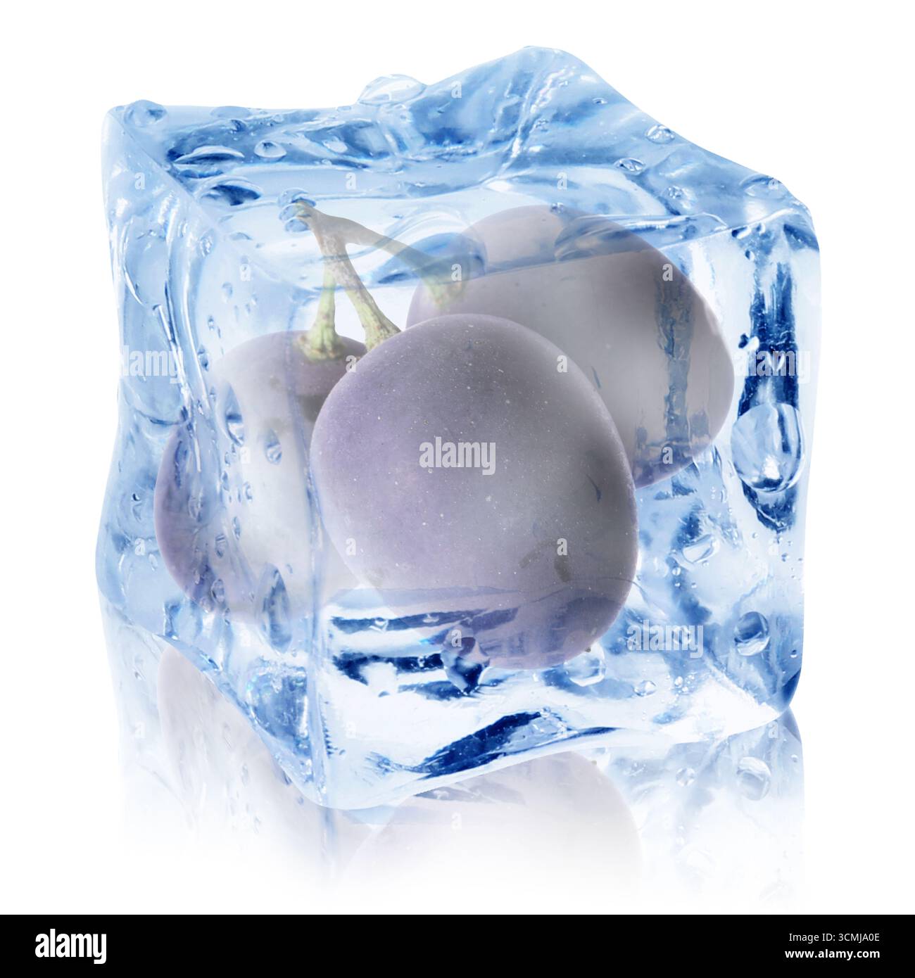 Fresh grapes inside ice cube on white background Stock Photo - Alamy