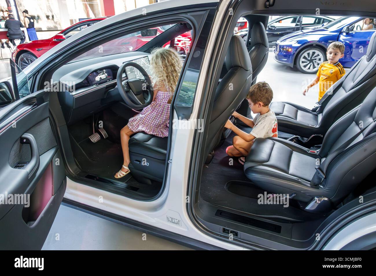 Girl child sitting driver seat hi-res stock photography and images - Alamy