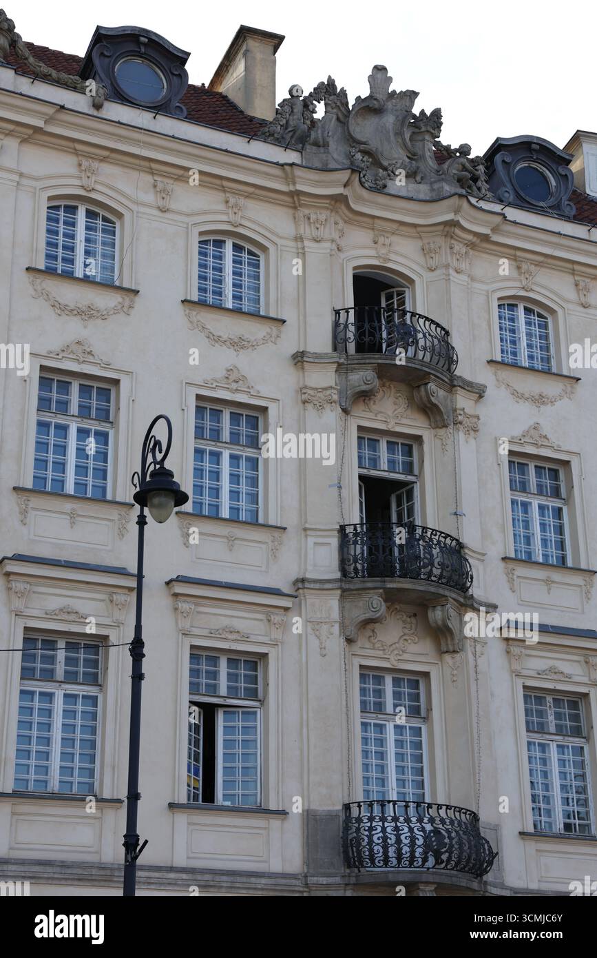 Warsaw old town building with classic balcony and ornate urban details ...