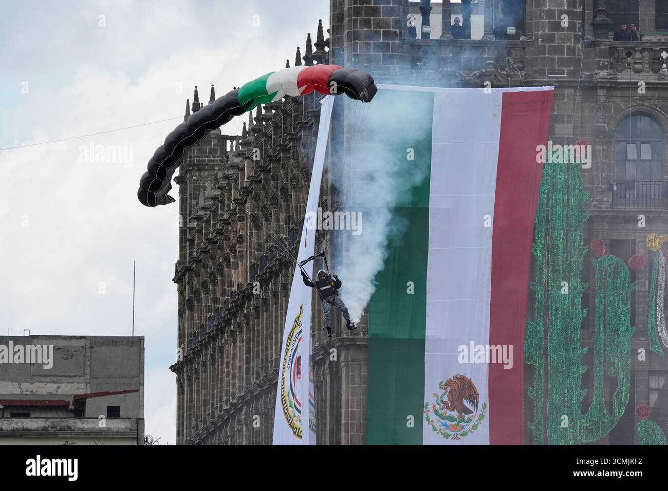A National Guards parachutes down onto the Zocalo, Mexico City's main ...