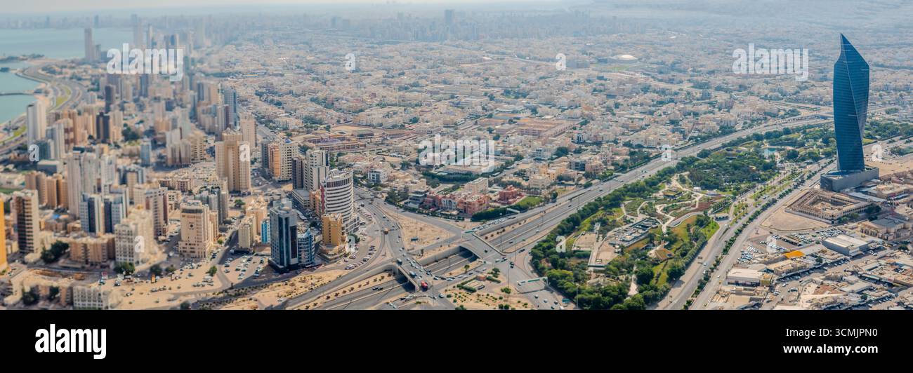 Aerial panoramic view of Kuwait City featuring the Tijaria Tower ...