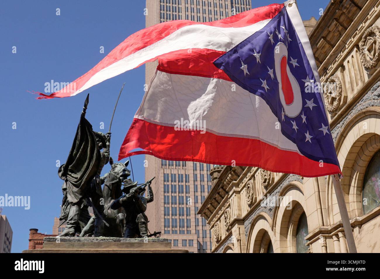 A state of Ohio flag flies in front of the Soldiers' and Sailors ...