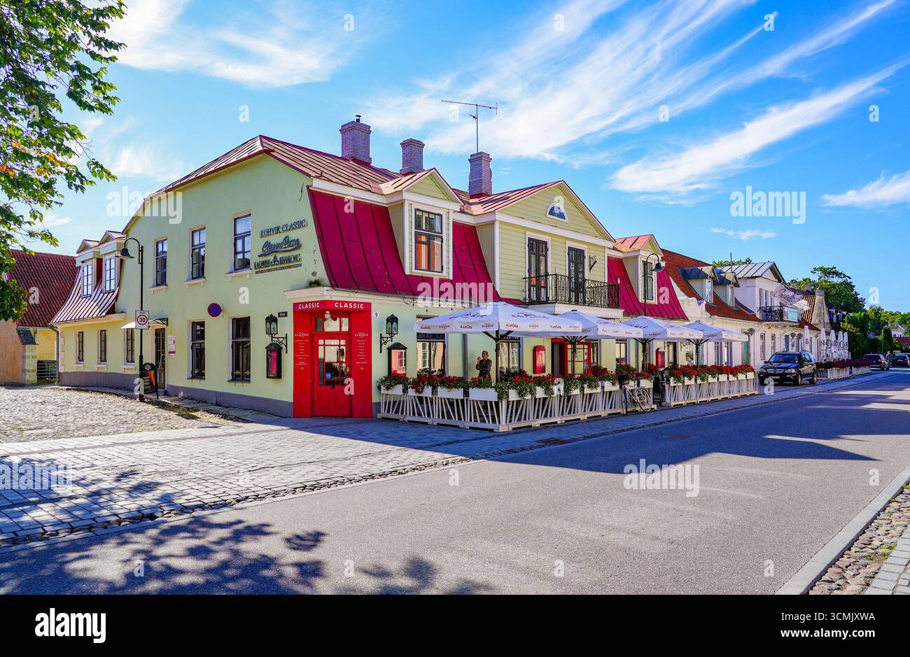 Restaurant terrace in the Old Town of Kuressaare on the Estonian island ...