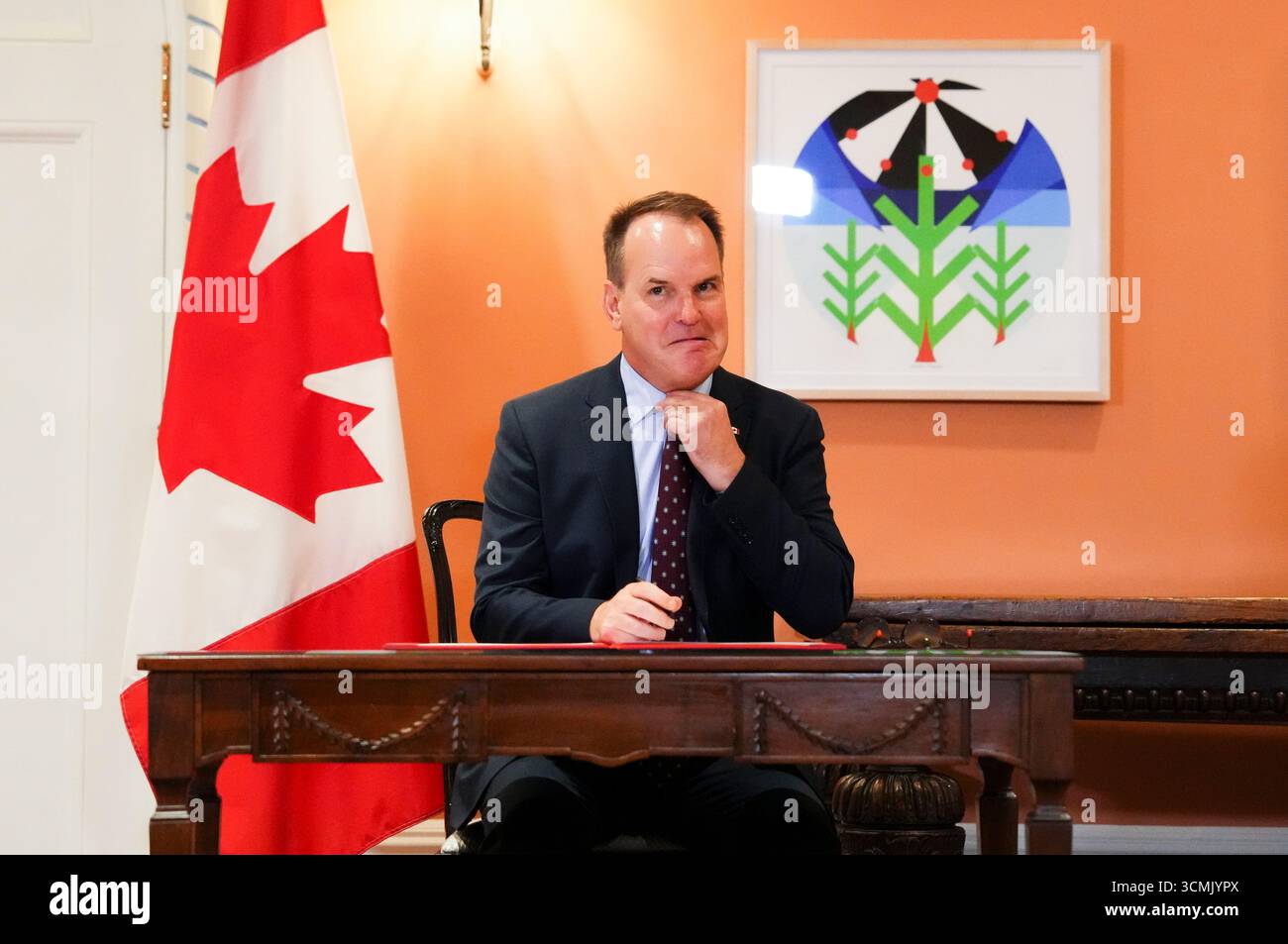Leader of the Government in the House of Commons Steven MacKinnon signs ...