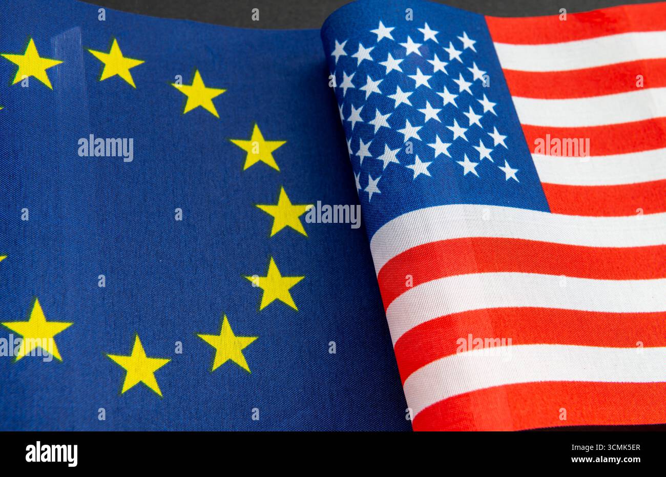 A close up of the European Union flag together with the USA national ...