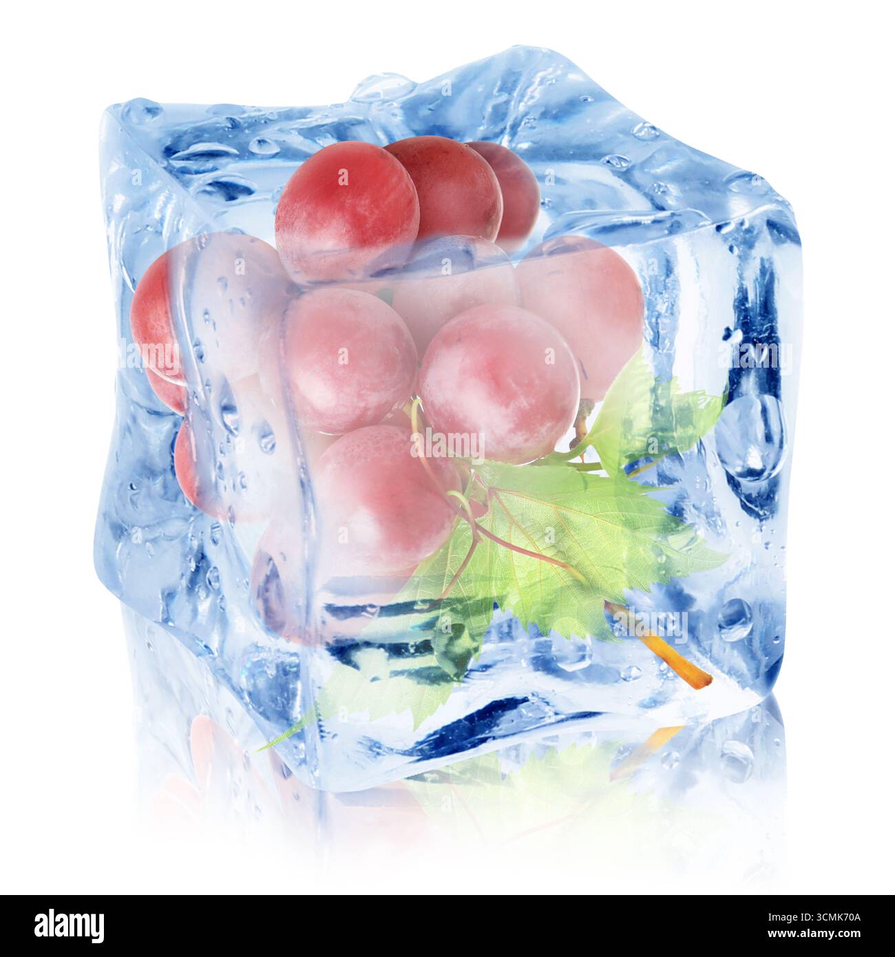Fresh grapes inside ice cube on white background Stock Photo - Alamy