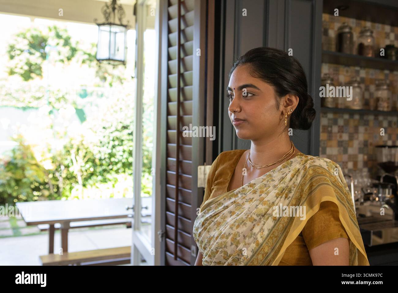Indian woman wearing mustard hi-res stock photography and images - Alamy