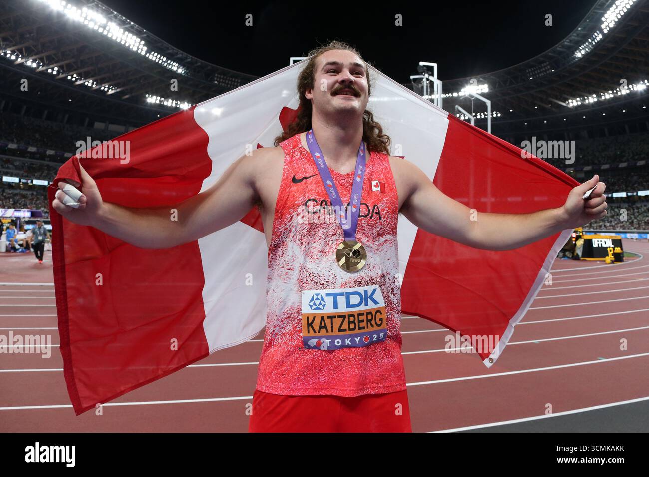 Sep 16, 2025; Tokyo, Japan; Ethan Katzberg (CAN) poses with gold medal ...