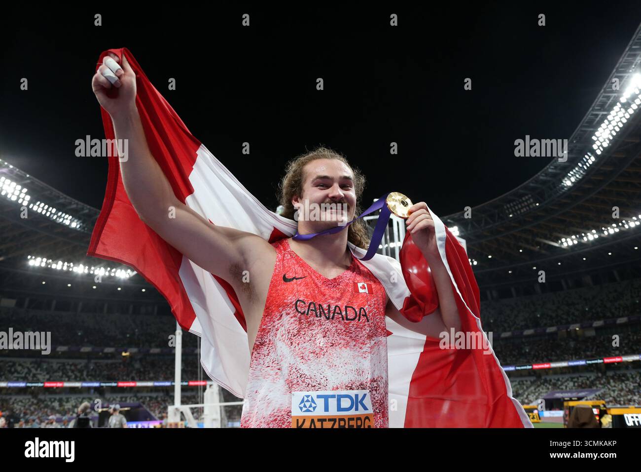 Sep 16, 2025; Tokyo, Japan; Ethan Katzberg (CAN) poses with gold medal ...