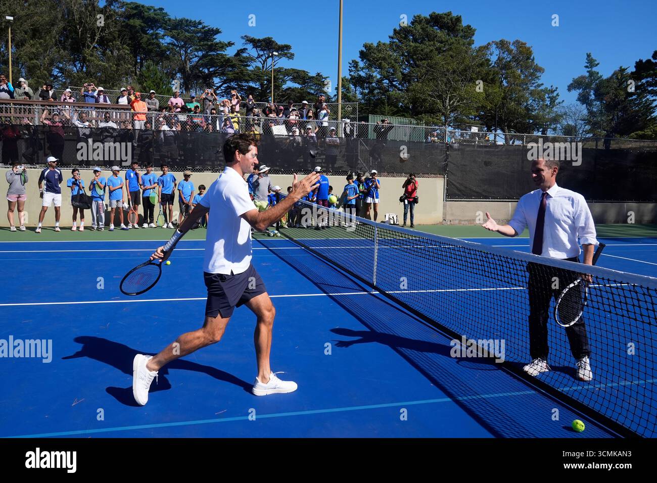 Co-creator of the Laver Cup Roger Federer, left, greets San Francisco ...