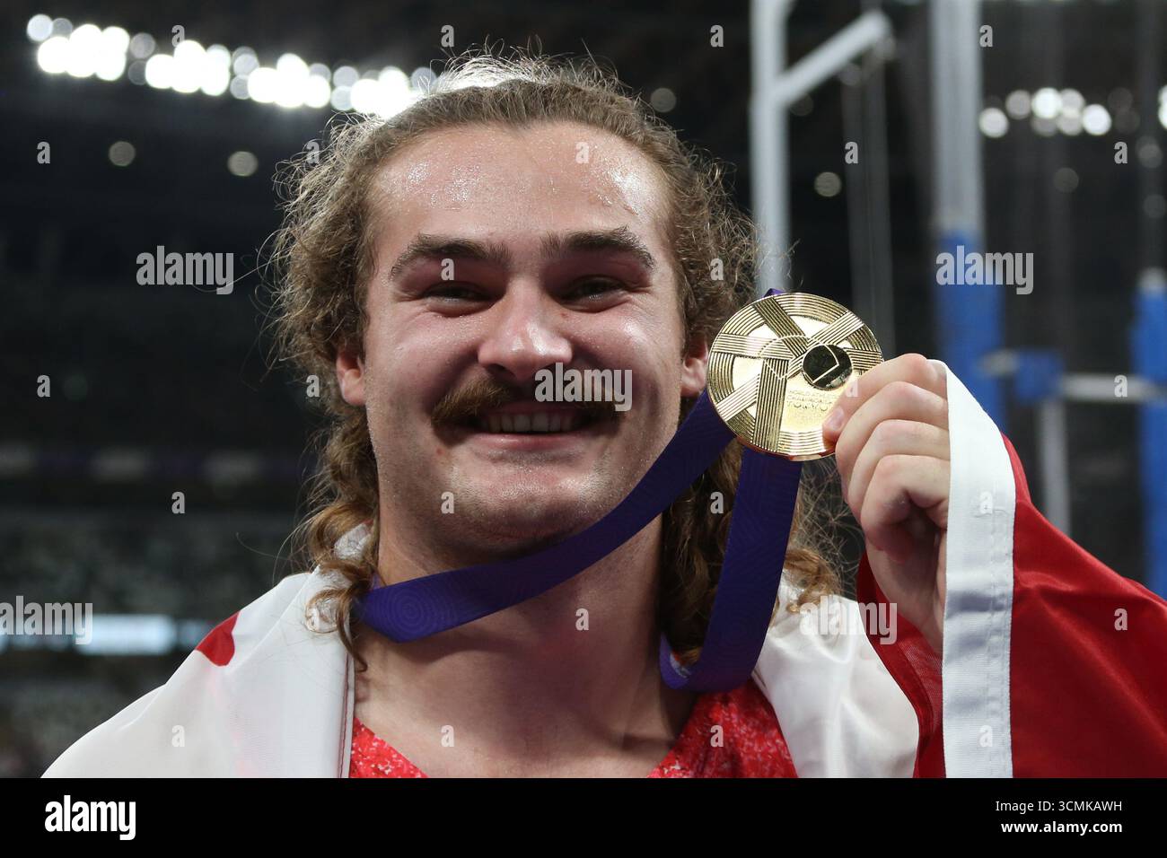 Sep 16, 2025; Tokyo, Japan; Ethan Katzberg (CAN) poses with gold medal ...