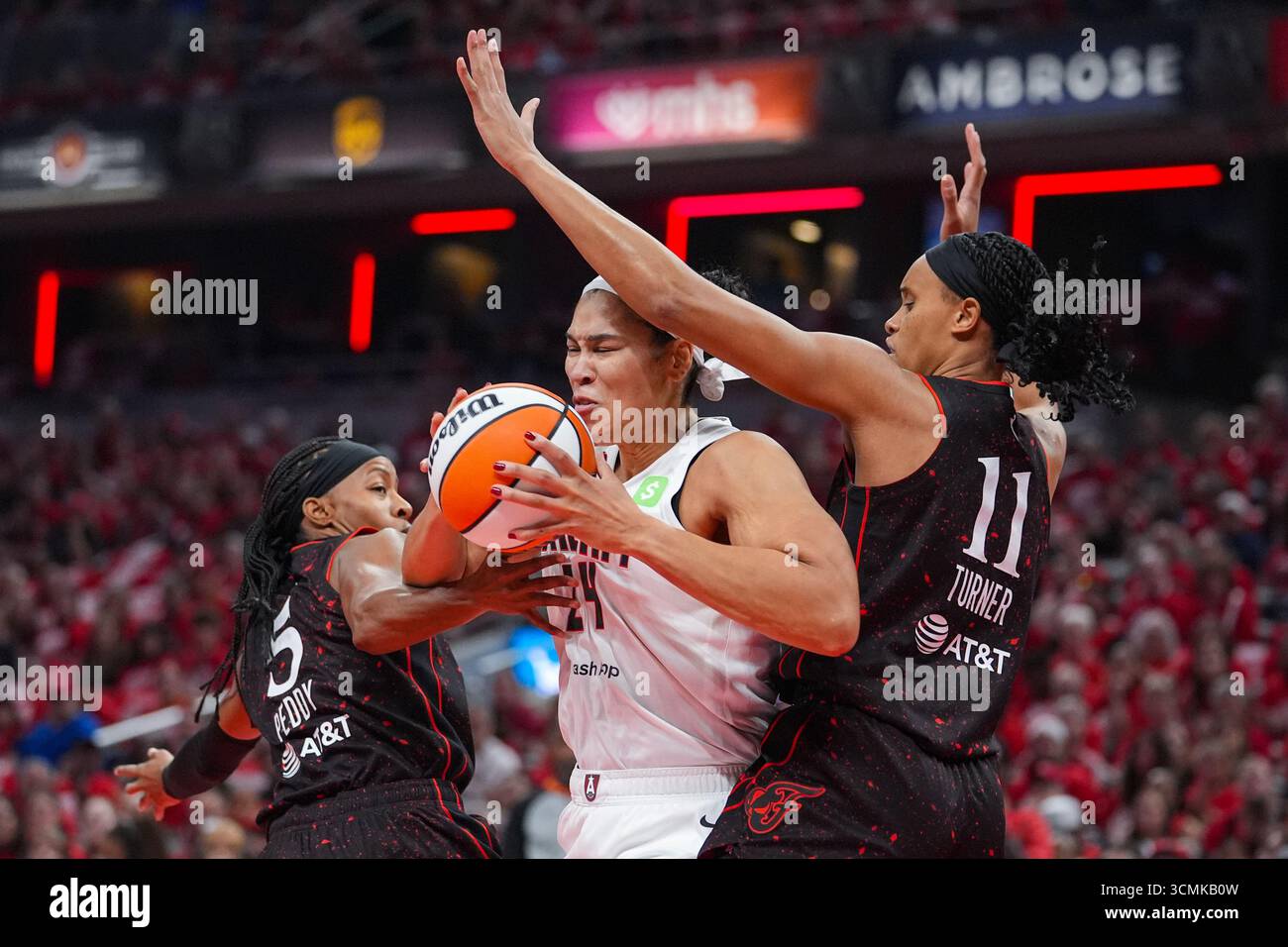 Atlanta Dream forward Brionna Jones (24) cuts between Indiana Fever ...