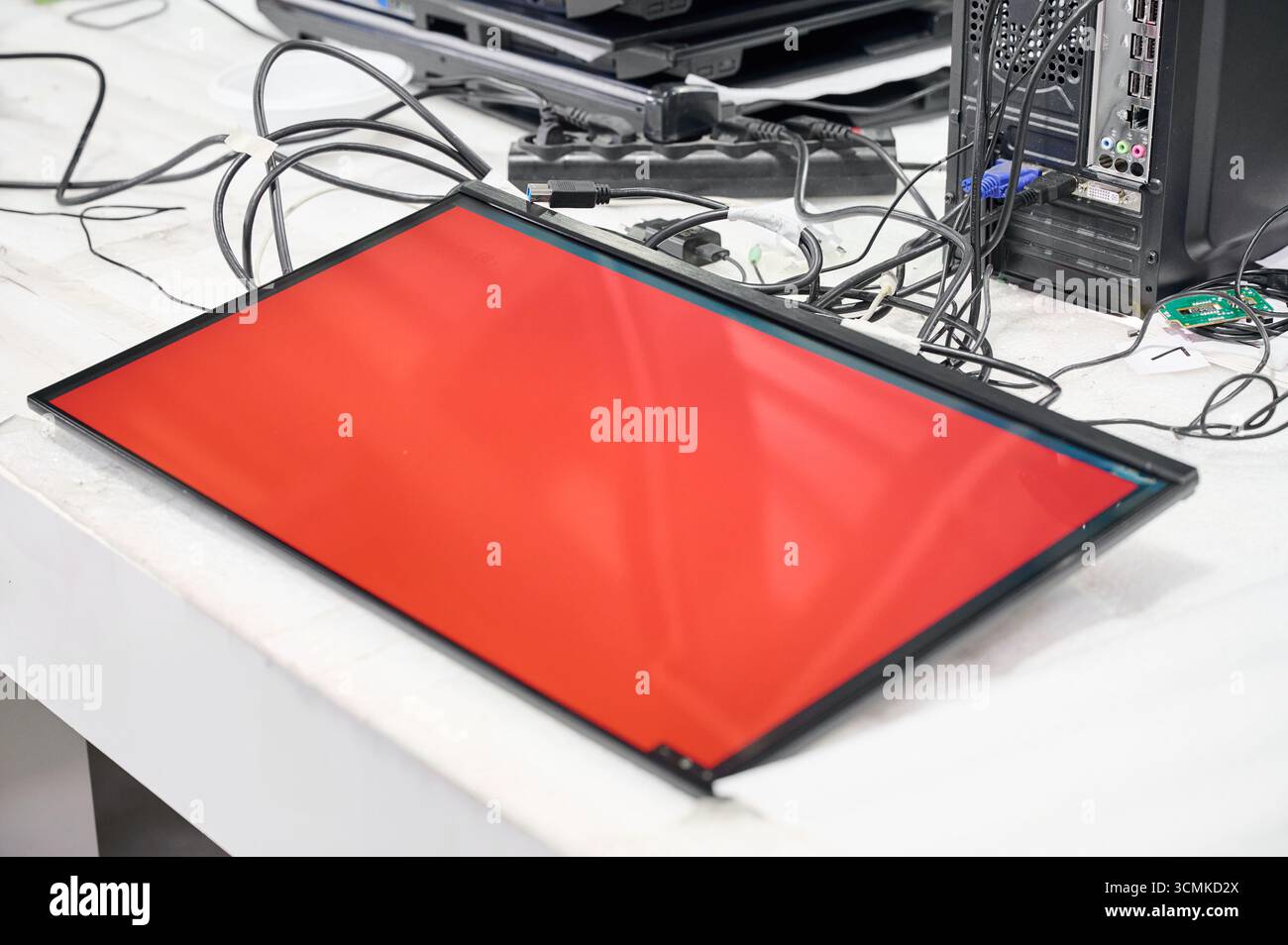 Testing monitor screens in electronics manufacturing facility with ...