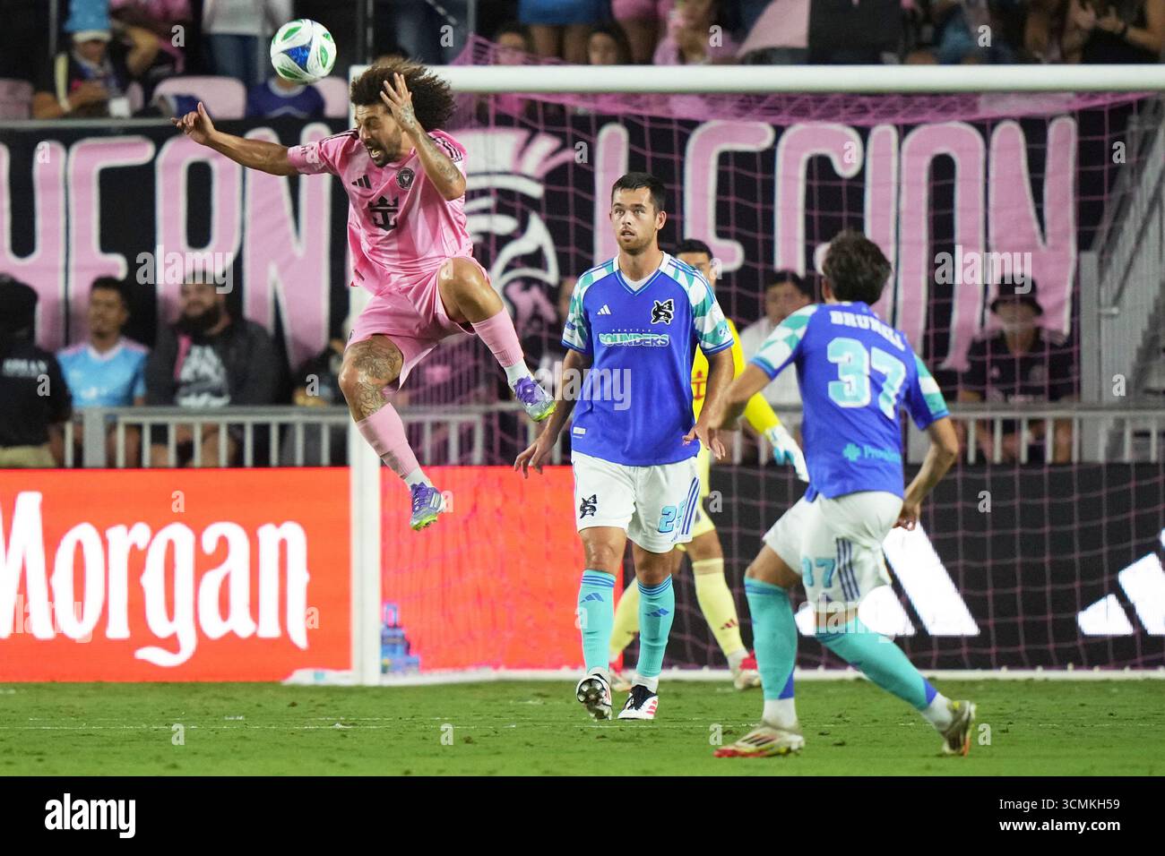 Inter Miami defender Maximiliano Falcón, left, heads the ball during ...