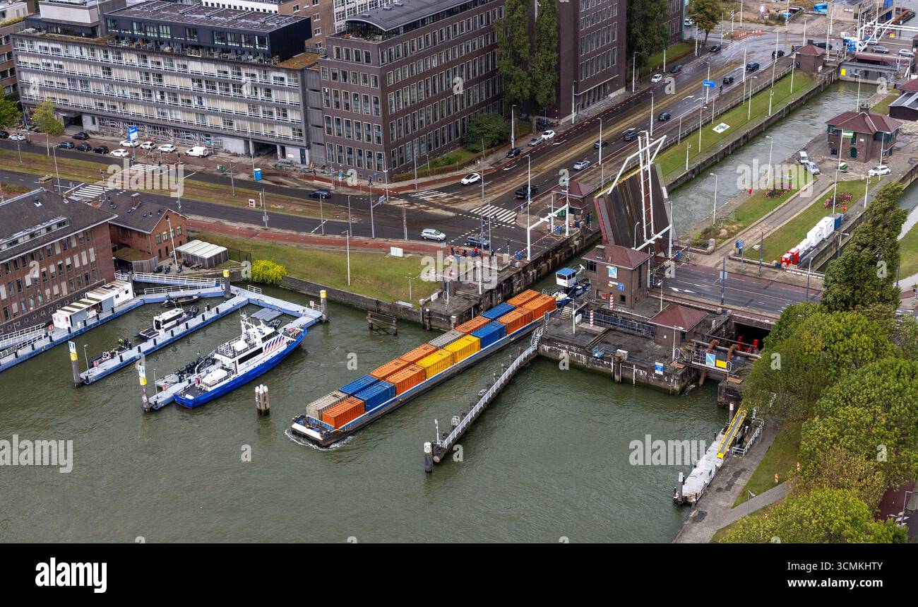 ROTTERDAM, THE NETHERLANDS - SEPTEMBER 13, 2025 - Barge passing under ...