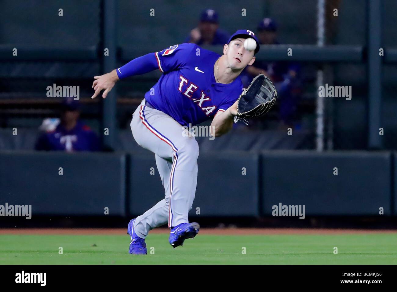 Texas Rangers left fielder Wyatt Langford makes the catch for the out ...