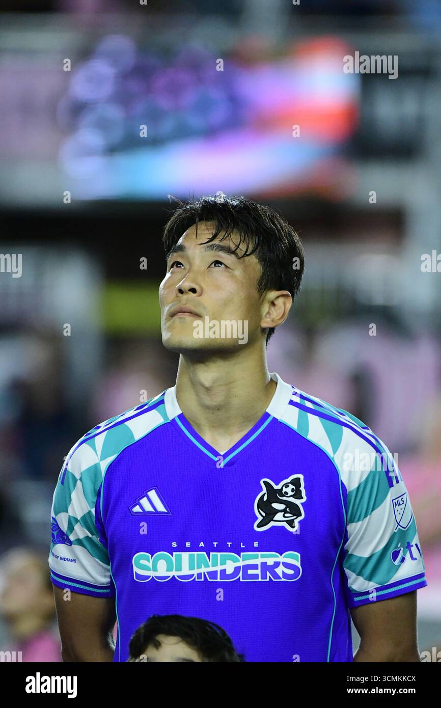 Seattle Sounders defender Kim Kee-Hee (20) listens to the national ...