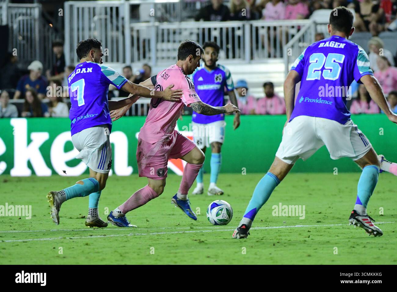 Inter Miami forward Lionel Messi (10) dribbles past a defender September 16, 2025 at Chase ...