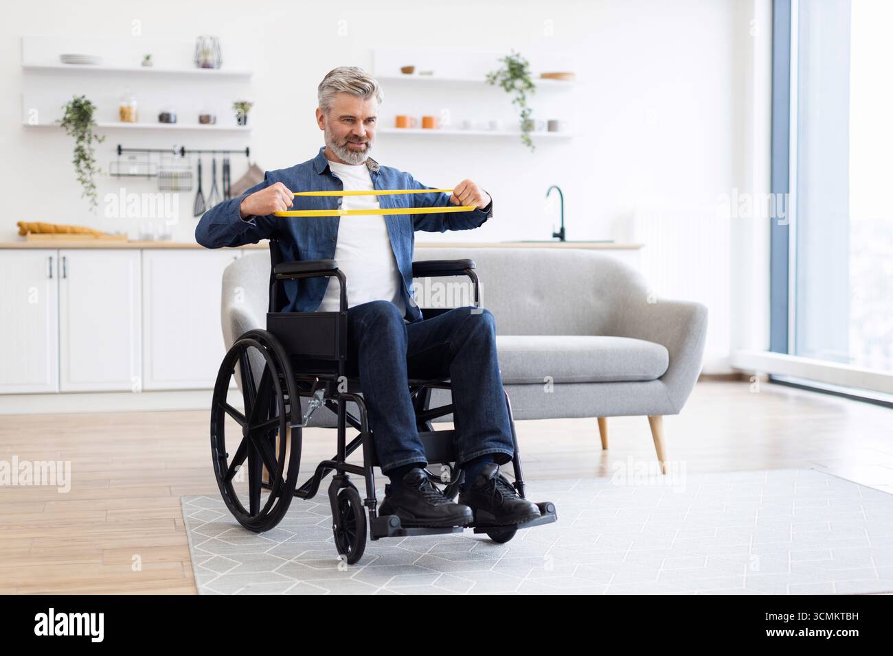 Stretching wheelchair user man hi-res stock photography and images - Alamy