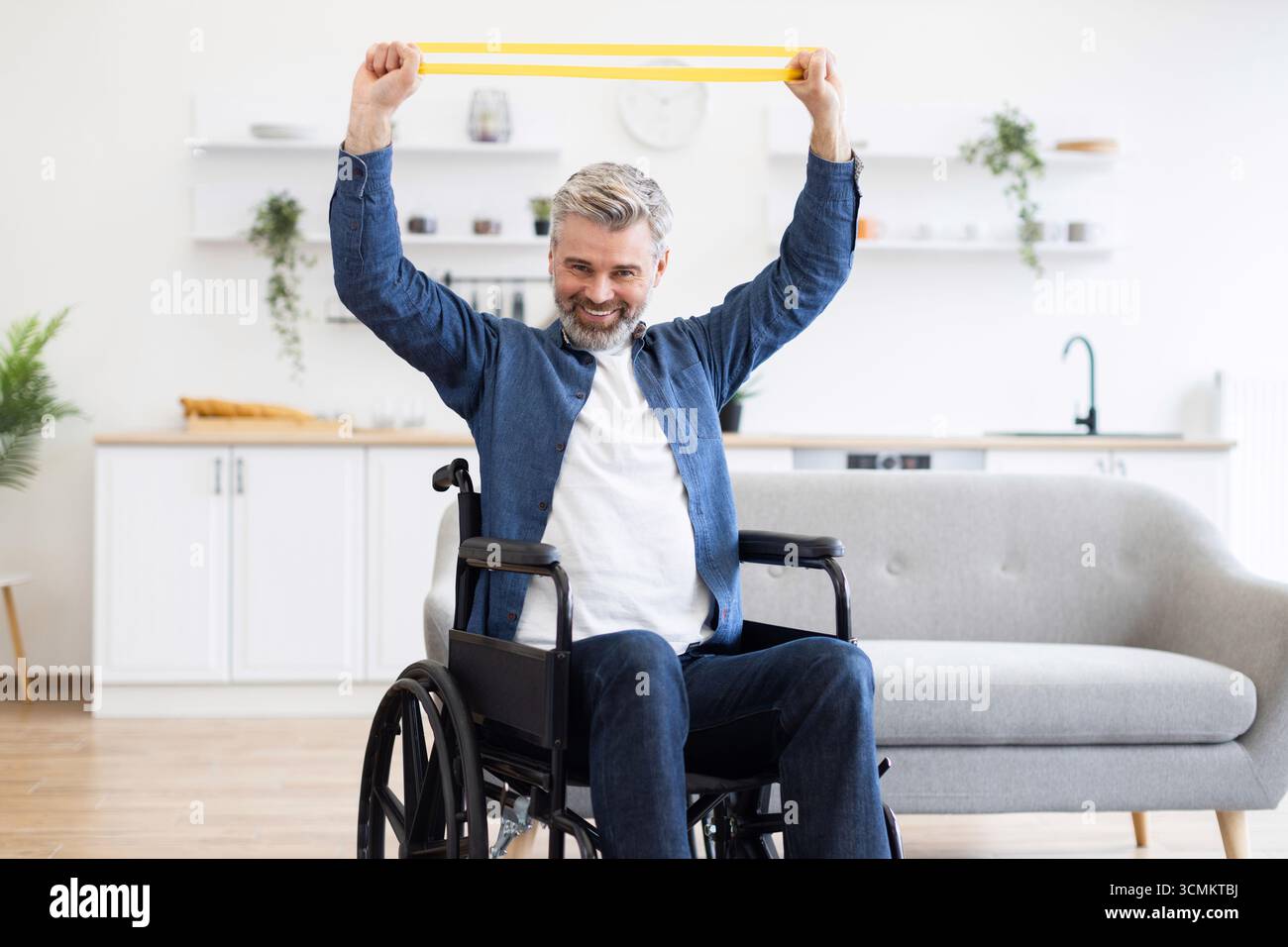 Stretching wheelchair user man hi-res stock photography and images - Alamy