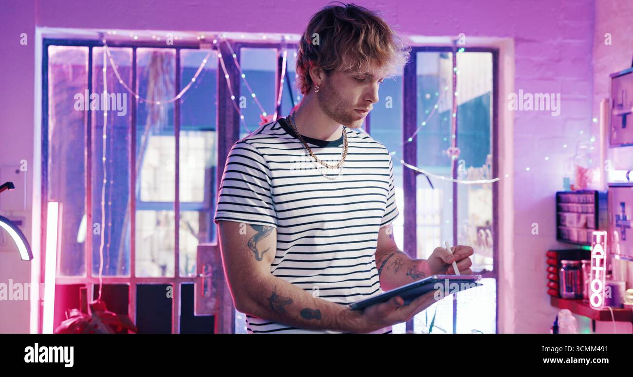 Drawing neon tablet man hi-res stock photography and images - Alamy