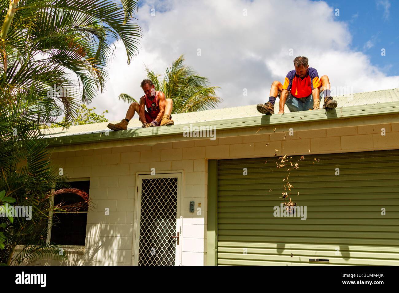 Man throwing hands on roof hi-res stock photography and images - Alamy