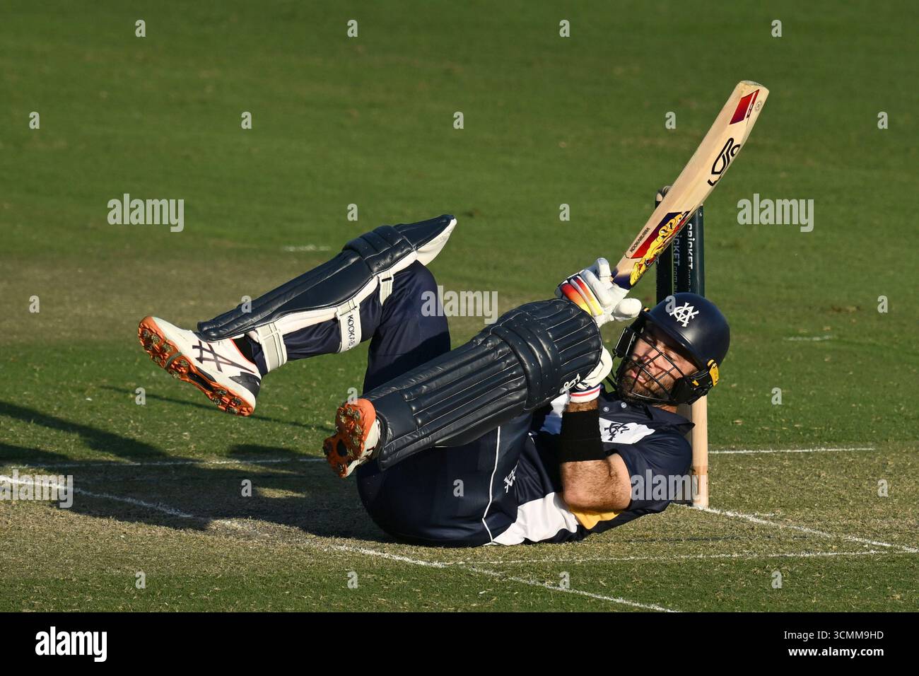 Glenn Maxwell of Victoria is seen after losing his footing while ...