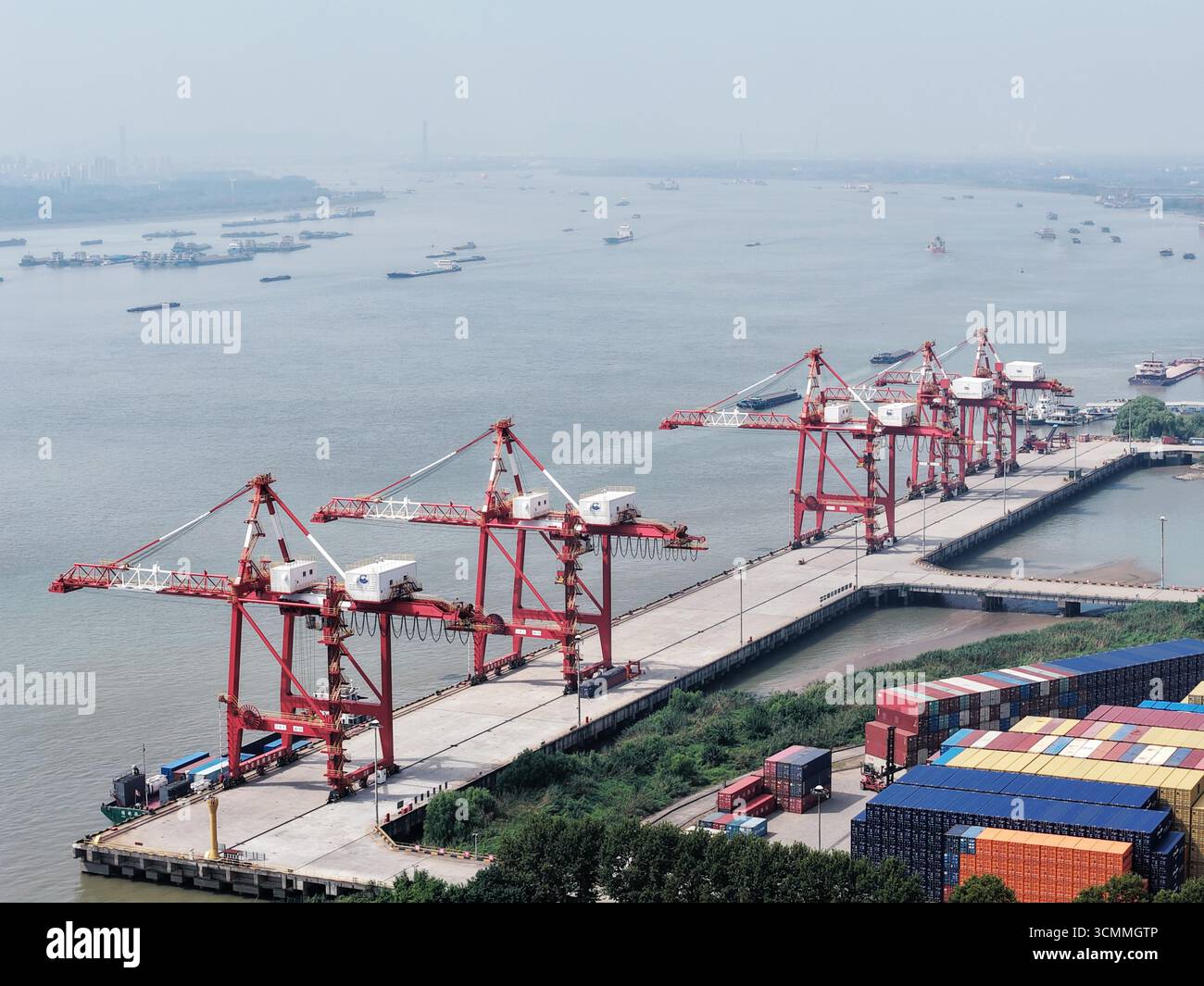 Aerial photo shows the busy container terminal at Yangzhou Port in ...