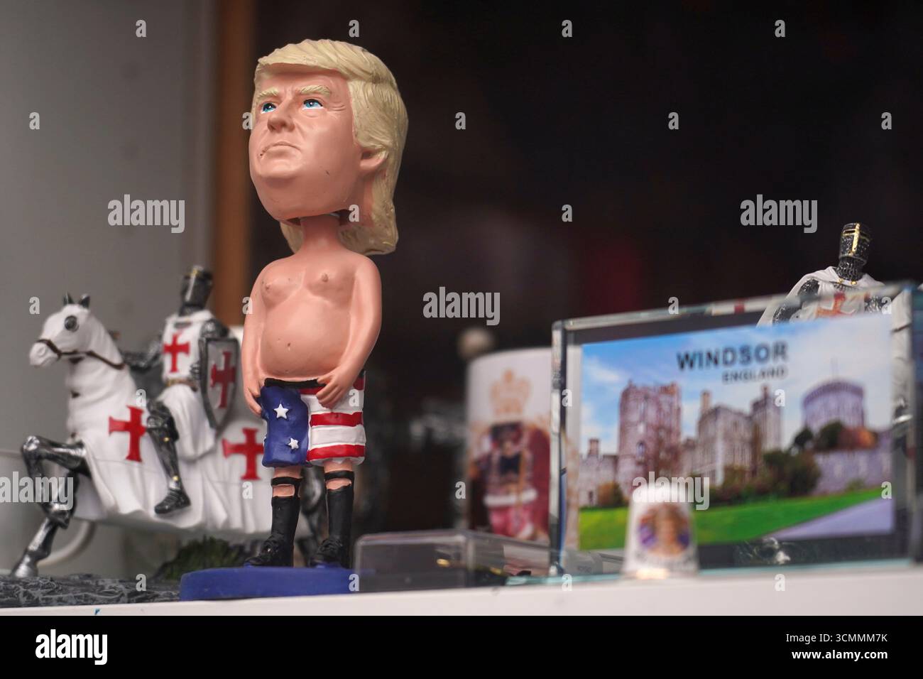 Royal and President Donald Trump themed merchandising products stand in ...