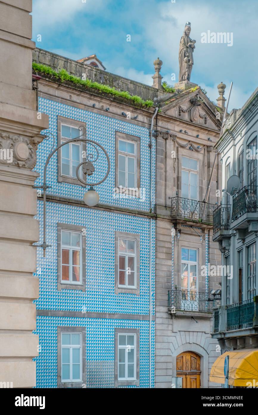 Portuguese Building With Blue Tiled Facade, Rooftop Garden and Statue ...