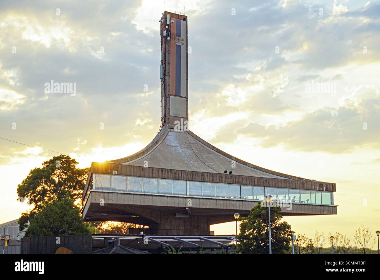 The 25 May building in Belgrade at sunset: unique concrete roof against ...