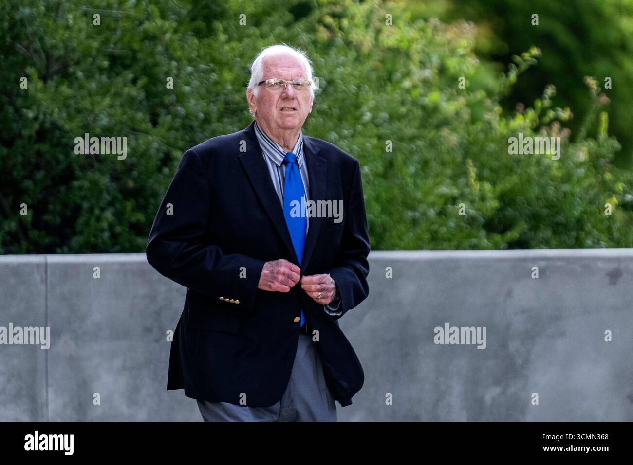 FILE -Orange County Superior Court Judge Jeffrey Ferguson walks out of ...