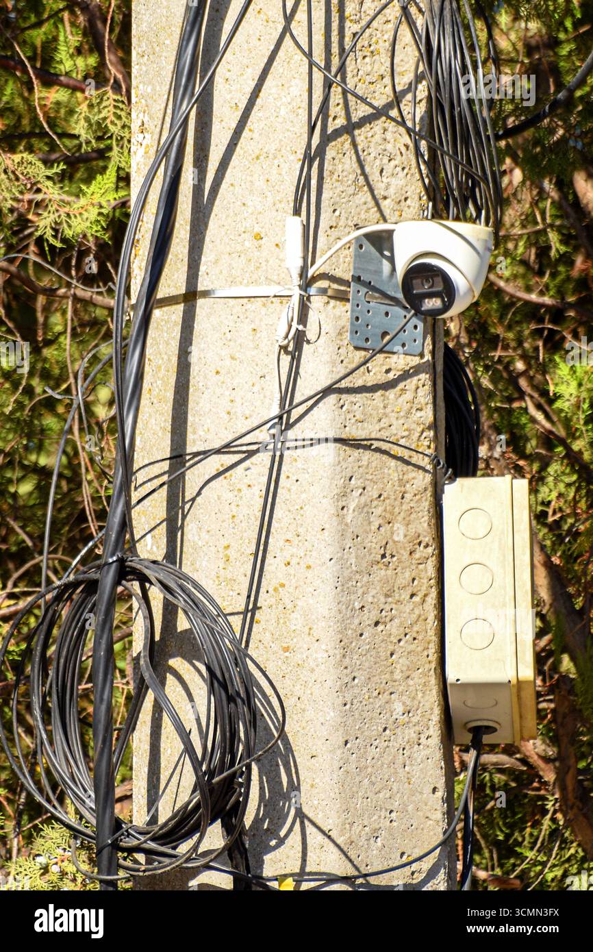 Utility pole with tangled wires and cables Stock Photo - Alamy