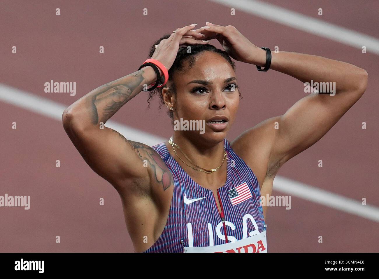 United States' Mckenzie Long reacts after competing the women's 200 ...