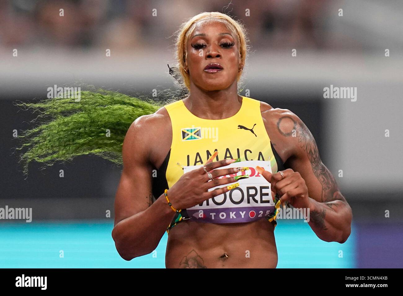 Jamaica's Ashanti Moore competes in women's 200 meters heat at the ...