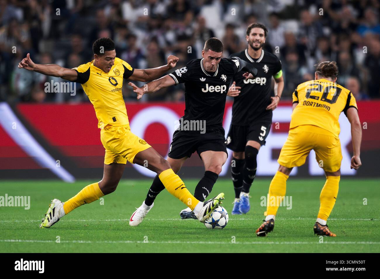 Dusan Vlahovic of Juventus FC comeptes for the ball with Jobe ...