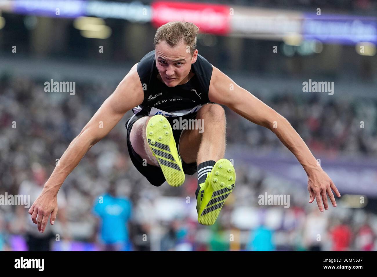 New Zealand's Ethan Olivier competes in the men's triple jump ...