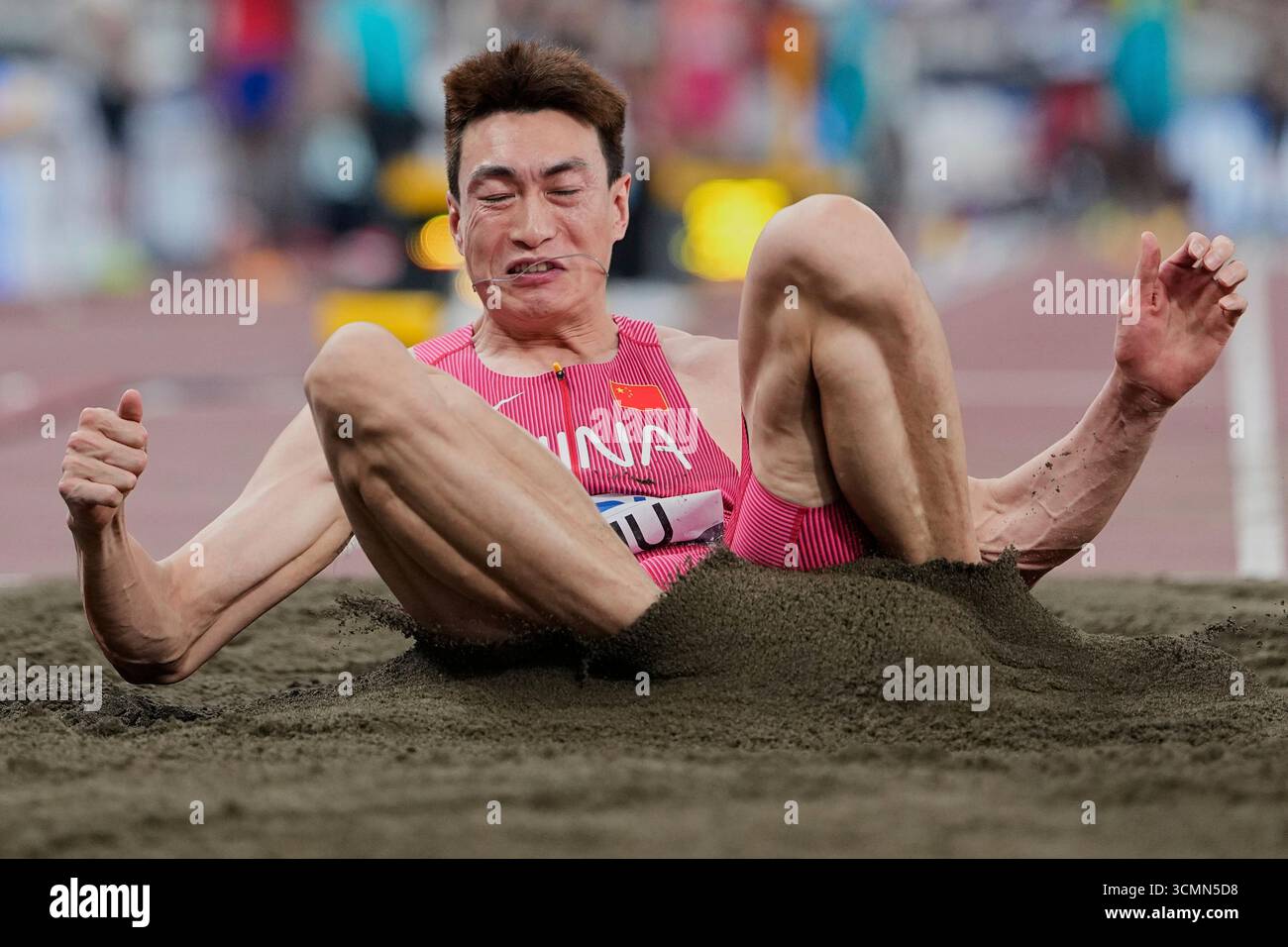 China's Zhu Yaming competes in the men's triple jump qualification at ...