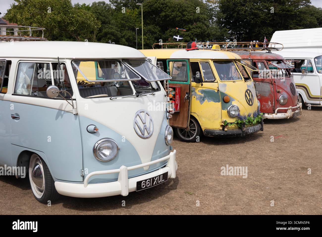 Row of colouful Retro iconic Vw camper Vans at Rally in Paignton Stock ...