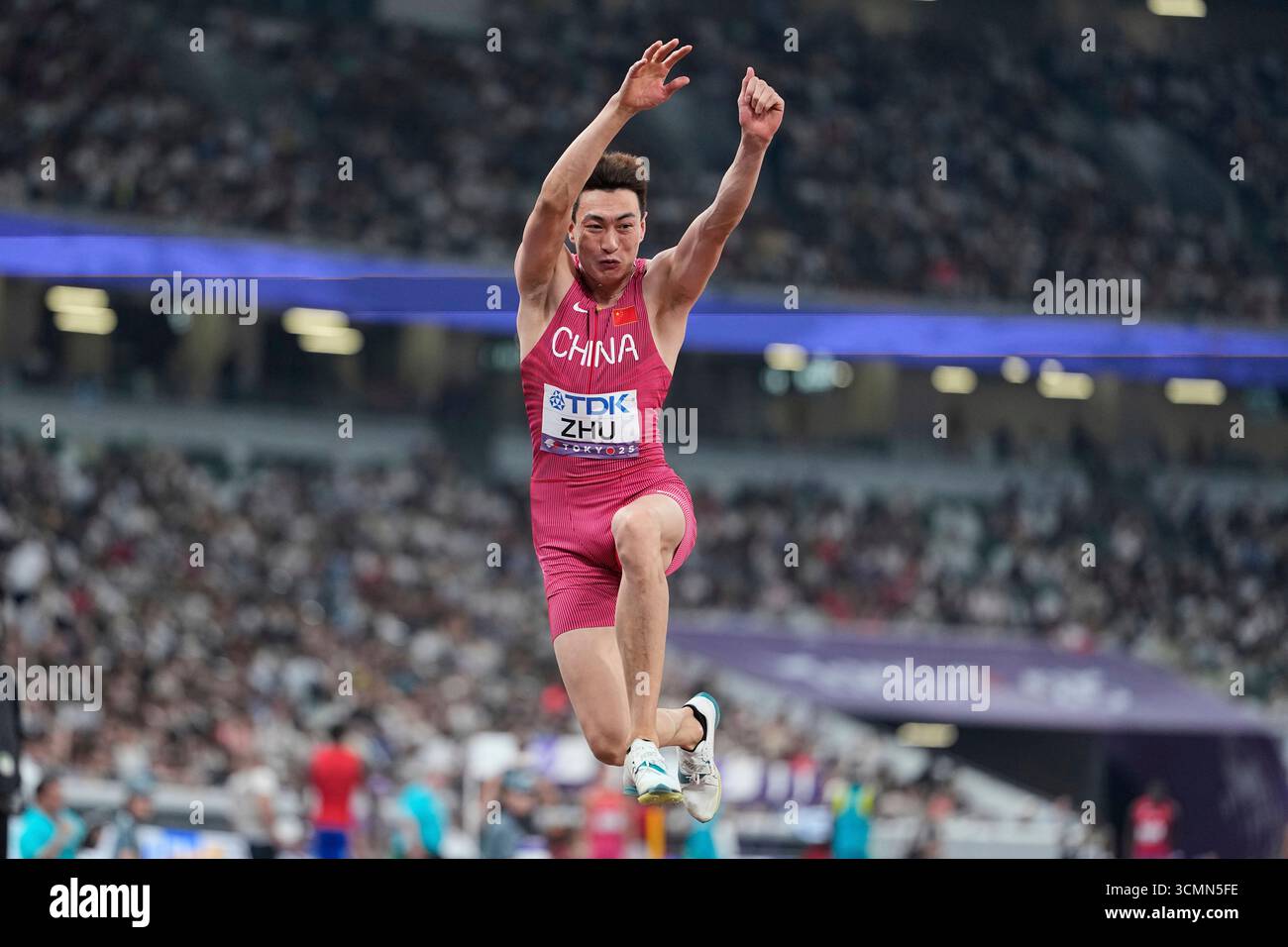 China's Zhu Yaming competes in the men's triple jump qualification at ...