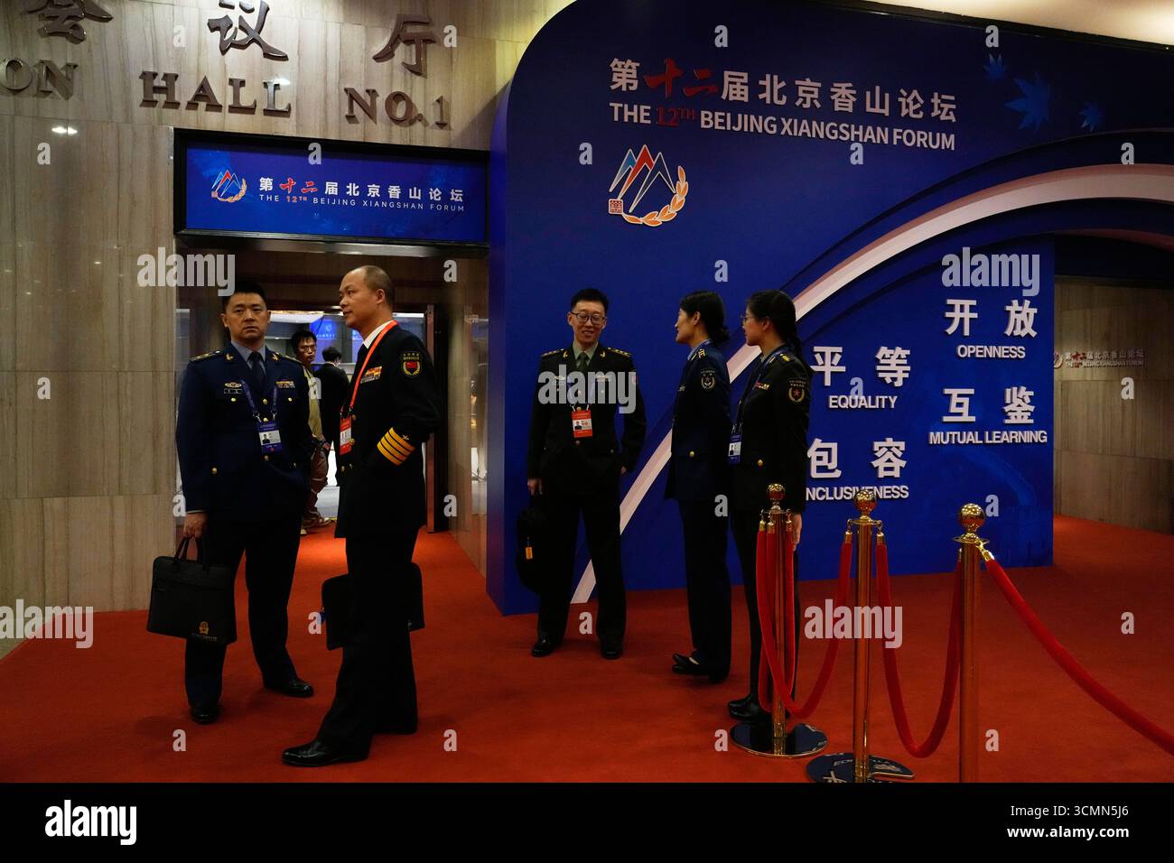 Chinese military personnel stand, ahead of the annual security and ...
