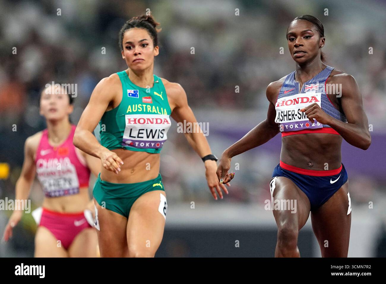 Britain's Dina Asher-Smith and Australia's Torrie Lewis race in a women ...